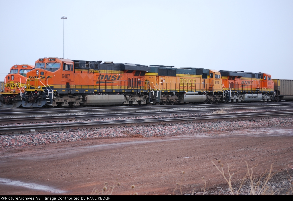 BNSF 6407 leads BNSF 8918 and BNSF 6379 on a mty coal train.